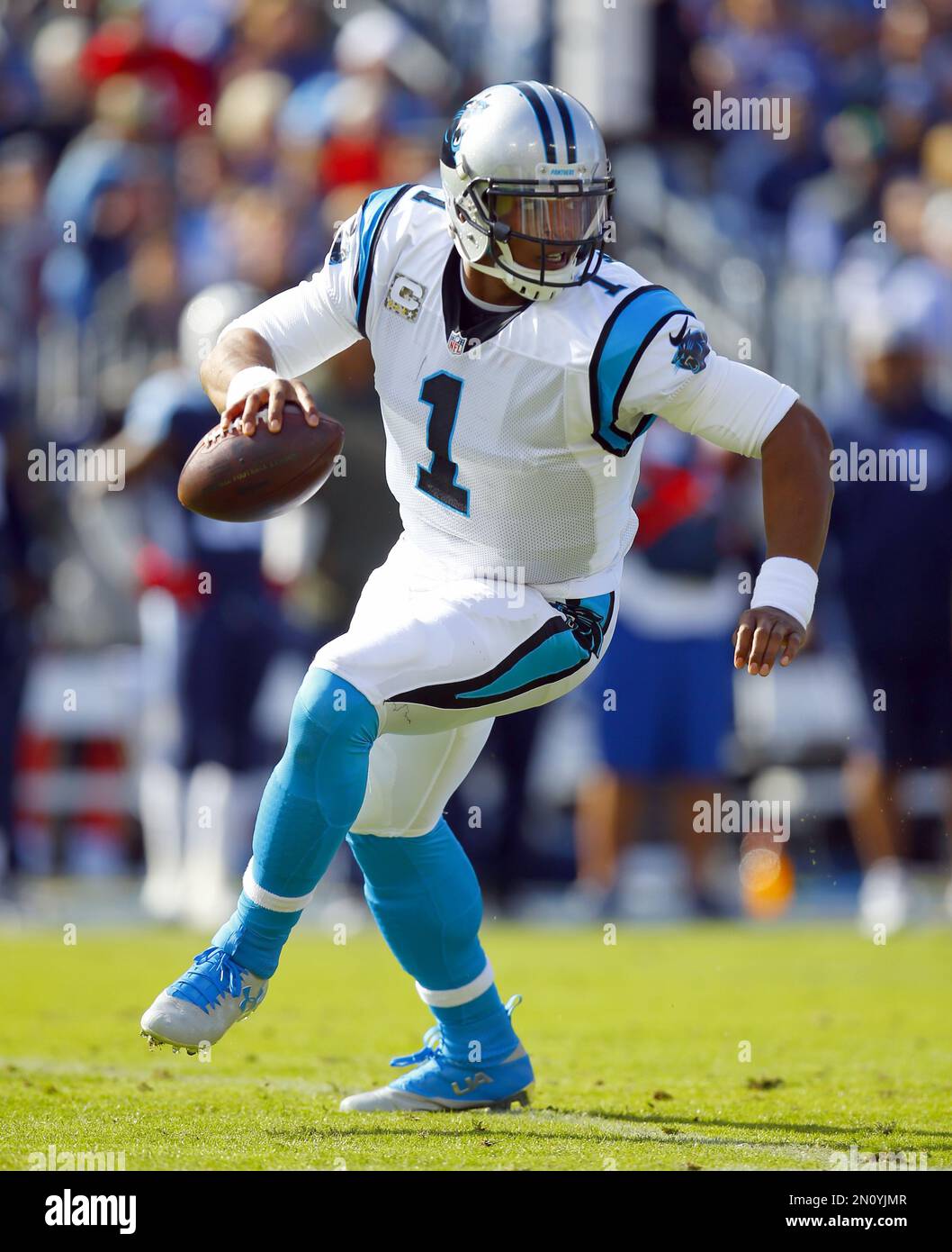 Carolina Panthers quarterback Cam Newton (1) scrambles out of the ...