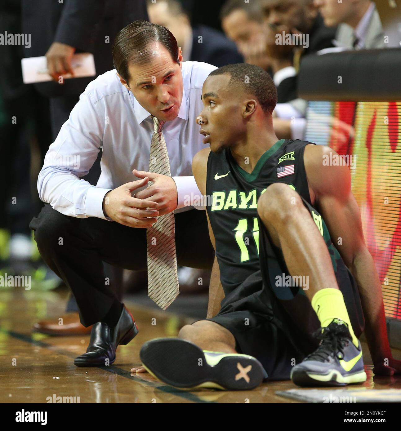 Baylor Head Coach Scott Drew gives instructions to Lester Medford as he ...
