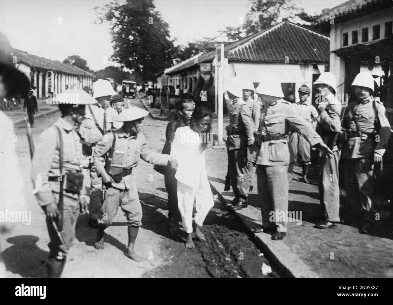 French soldiers arrest Vietnamese after taking part in a native ...
