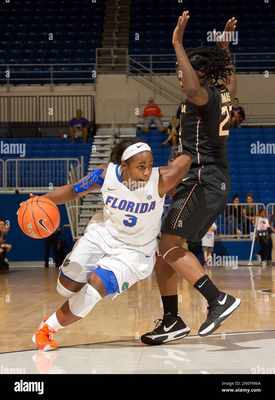 Florida guard January Miller (3) drives past Florida State forward ...
