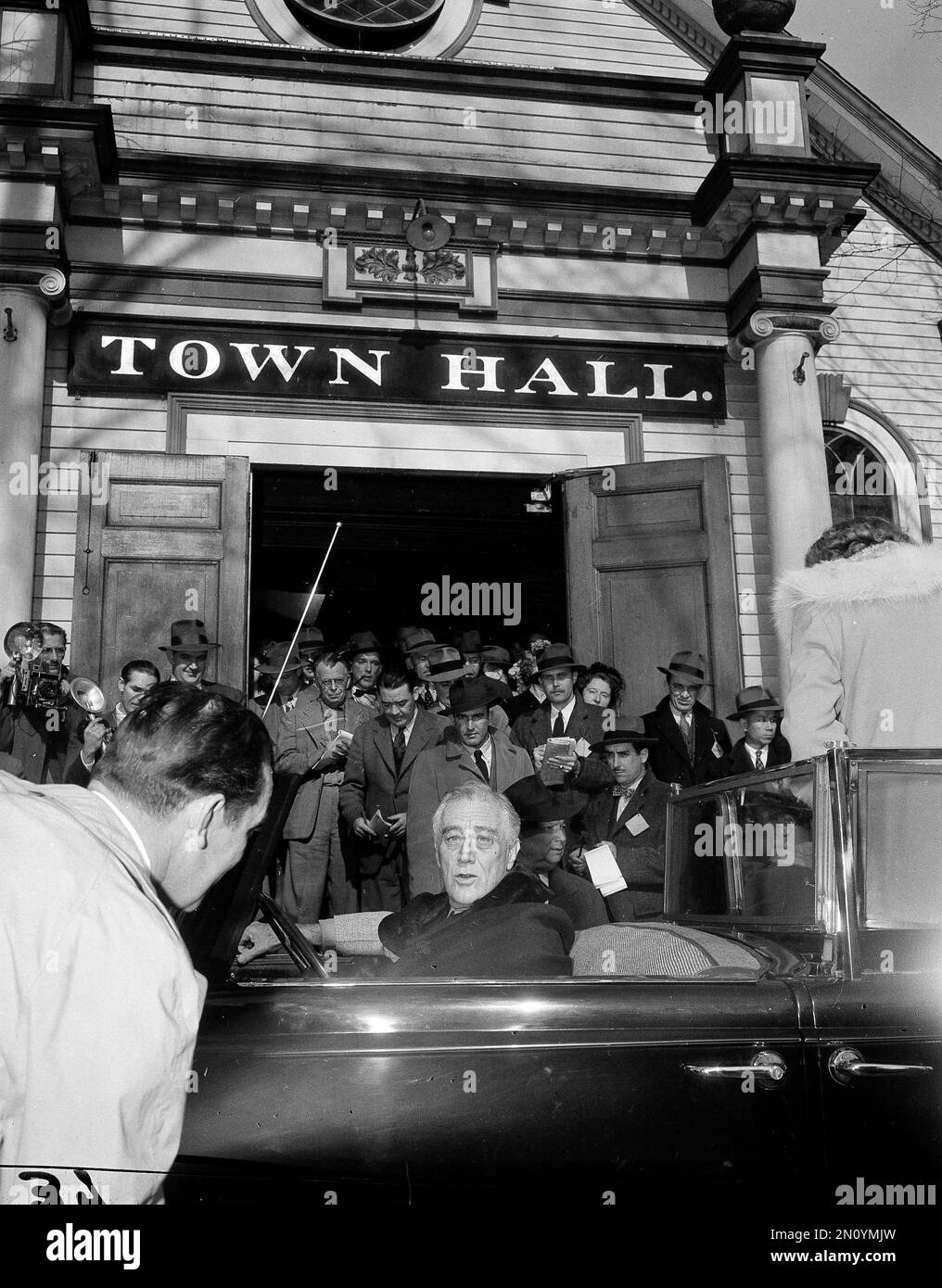 President Franklin D. Roosevelt pauses outside the Hyde Park, N.Y. Town ...