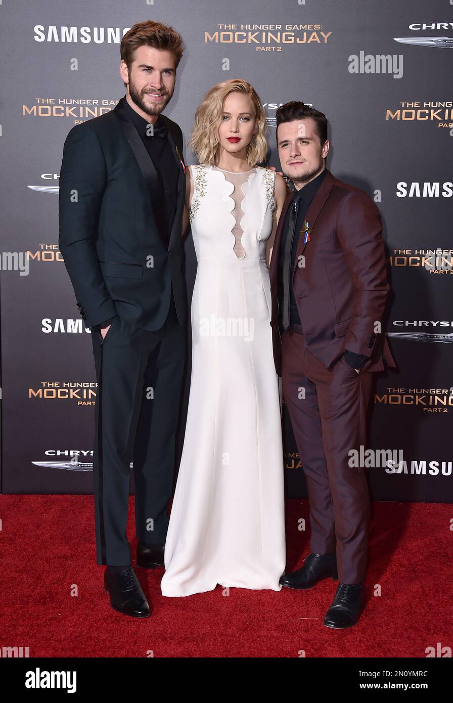 Liam Hemsworth, from left, Jennifer Lawrence and Josh Hutcherson attend ...