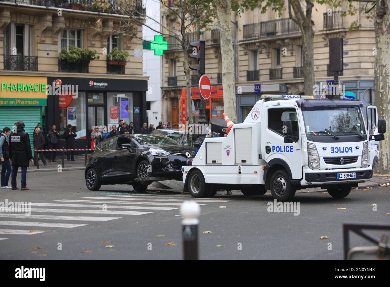 A police vehicle removes a Renault Clio with Belgian license plates in ...