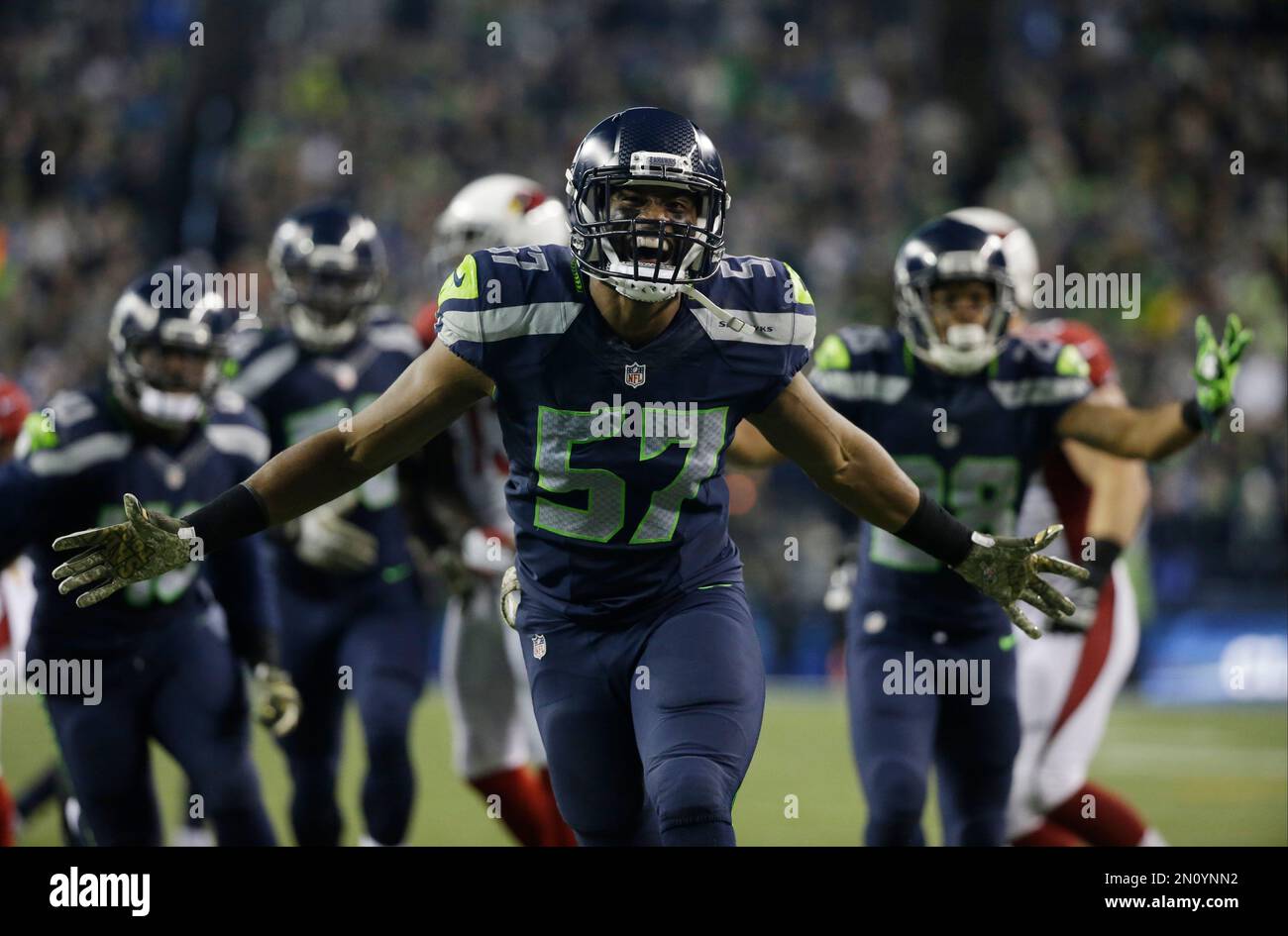 Seattle Seahawks outside linebacker Mike Morgan celebrates a play ...
