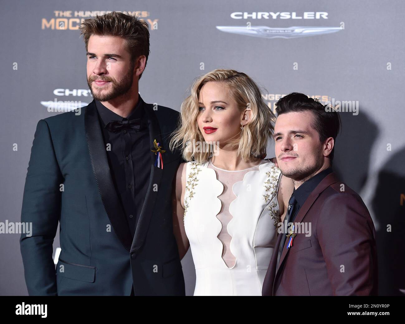 Liam Hemsworth, from left, Jennifer Lawrence and Josh Hutcherson attend ...