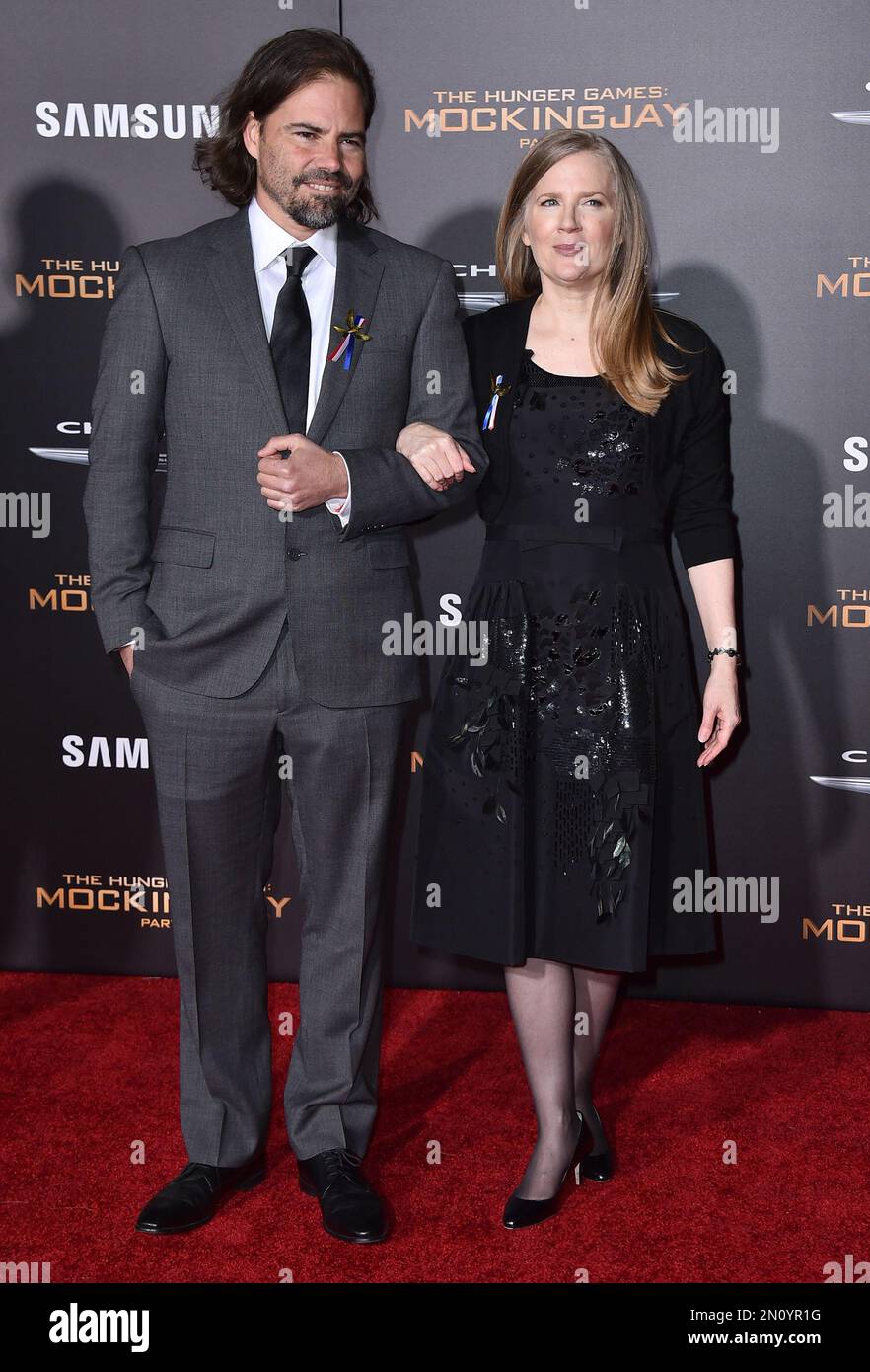 Peter Craig, left, and Suzanne Collins attend the Los Angeles premiere ...