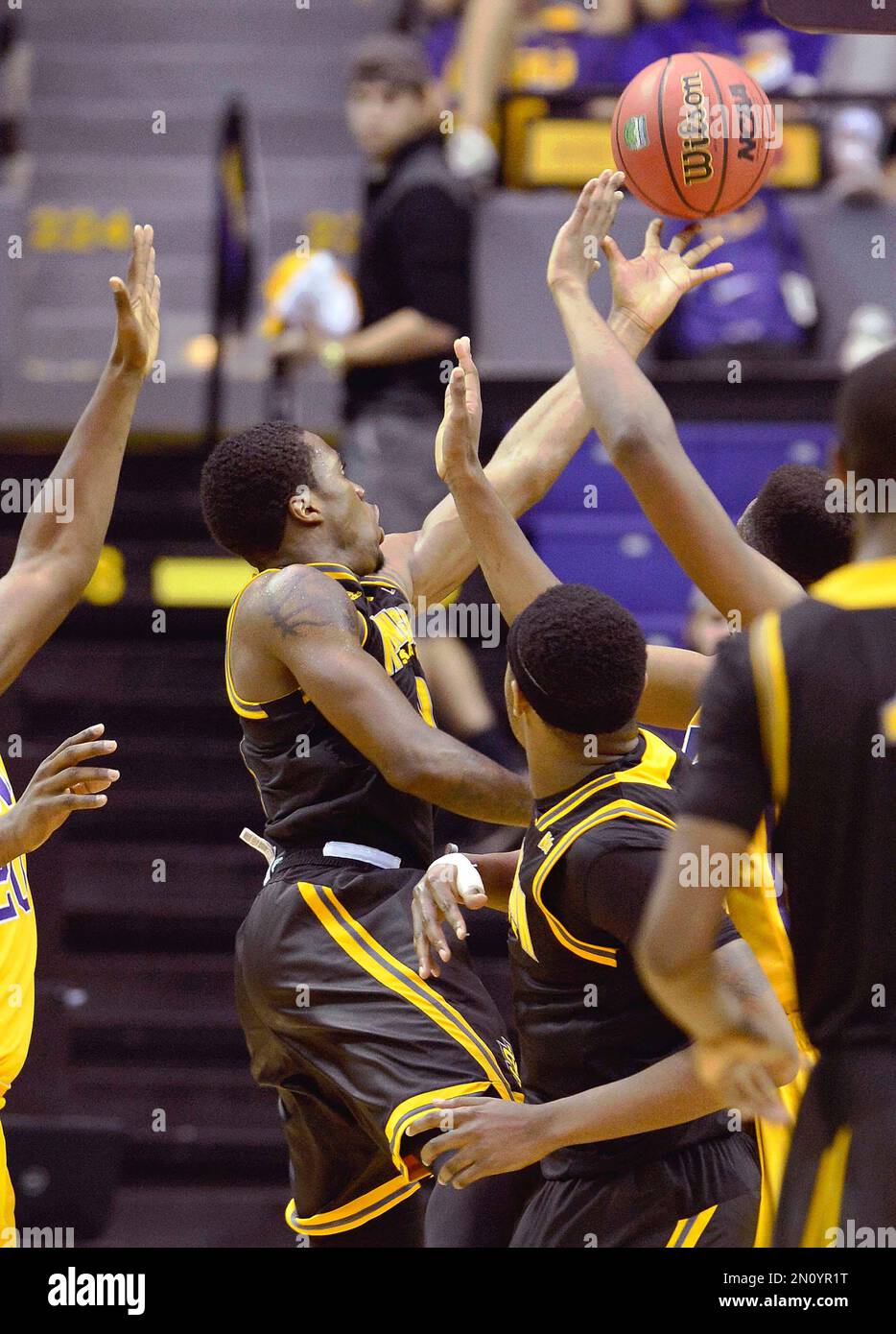 Kennesaw State guard Kendrick Ray, left, goes through heavy traffic to ...