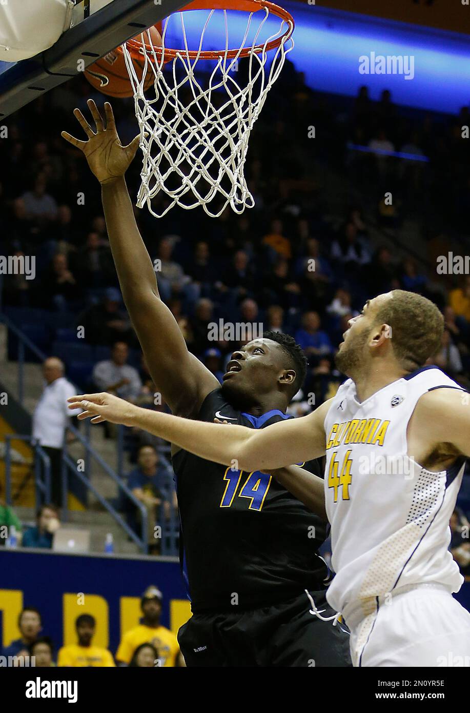 UC Santa Barbara forward Ami Lakoju (14) shoots over California center ...