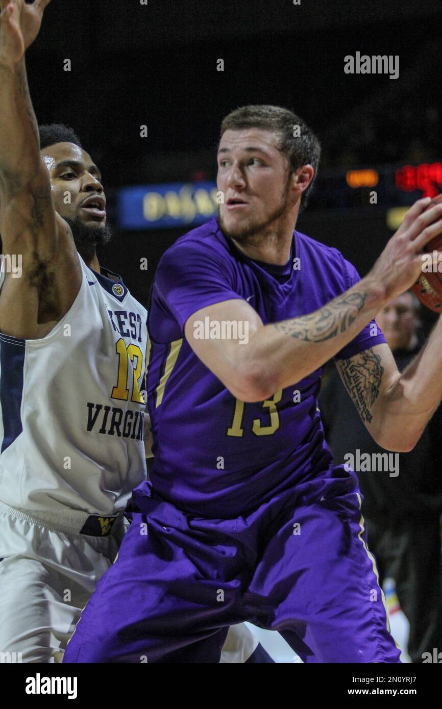 James Madison's Tom Vodanovich (13) looks to pass in the final minutes ...
