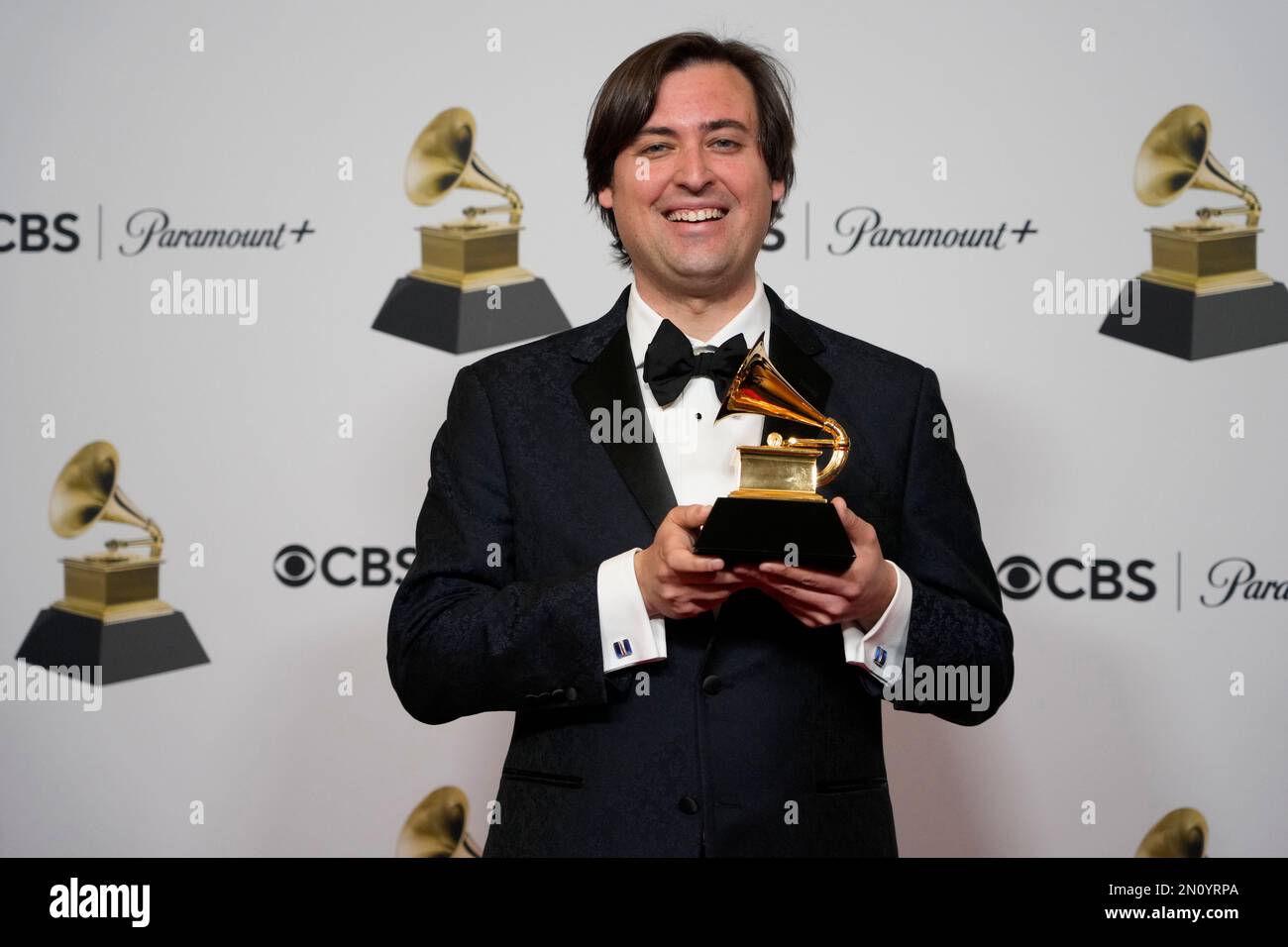 Michael Repper poses in the press room with the award for best ...