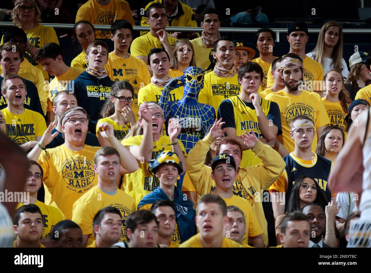 Michigan fans in the "Maize Rage" student section react in the first ...