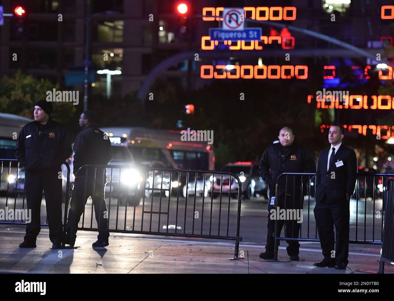Security guards and staff monitor the red carpet at the Los Angeles ...