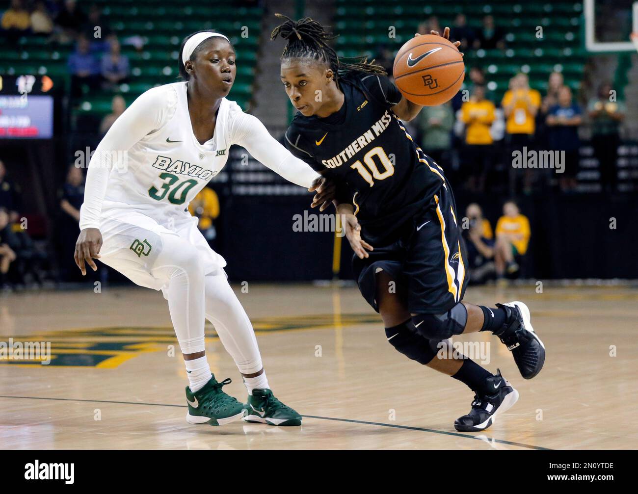 Baylor's Alexis Jones (30) defends as Southern Miss guard Jerontay ...