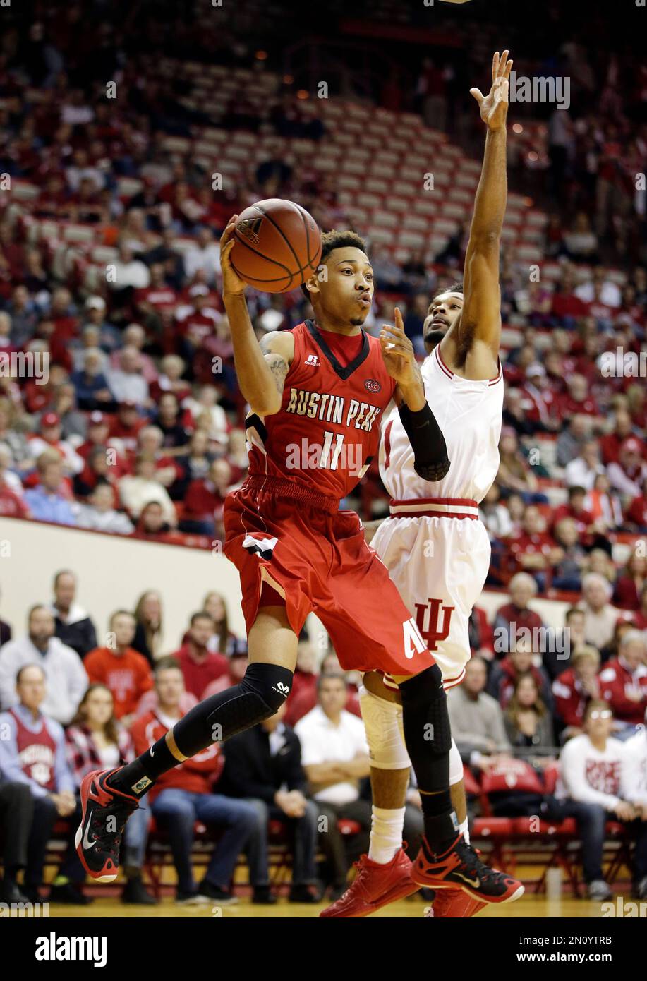 Austin Peay's Khalil Davis (11) makes a pass against Indiana's James ...