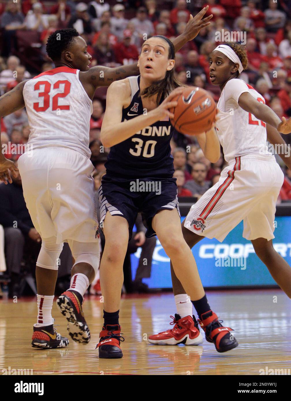 Connecticut's Breanna Stewart, center, drives to the basket between ...