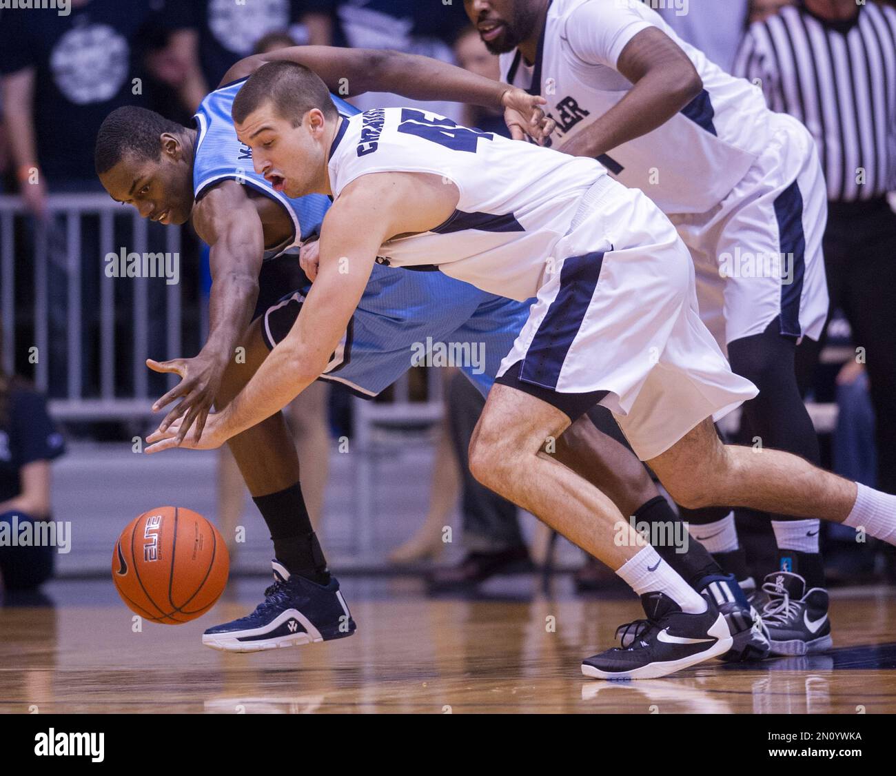 Citadel forward Quinton Marshall (33) battles to regain the ball as it ...