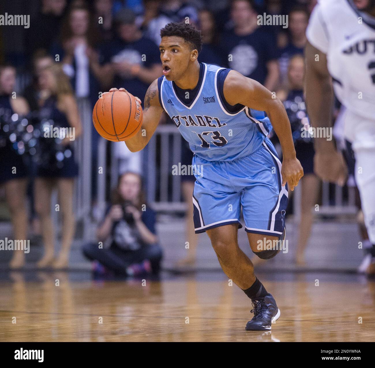 Citadel guard Tim Broom (13) races the ball up court during the second ...