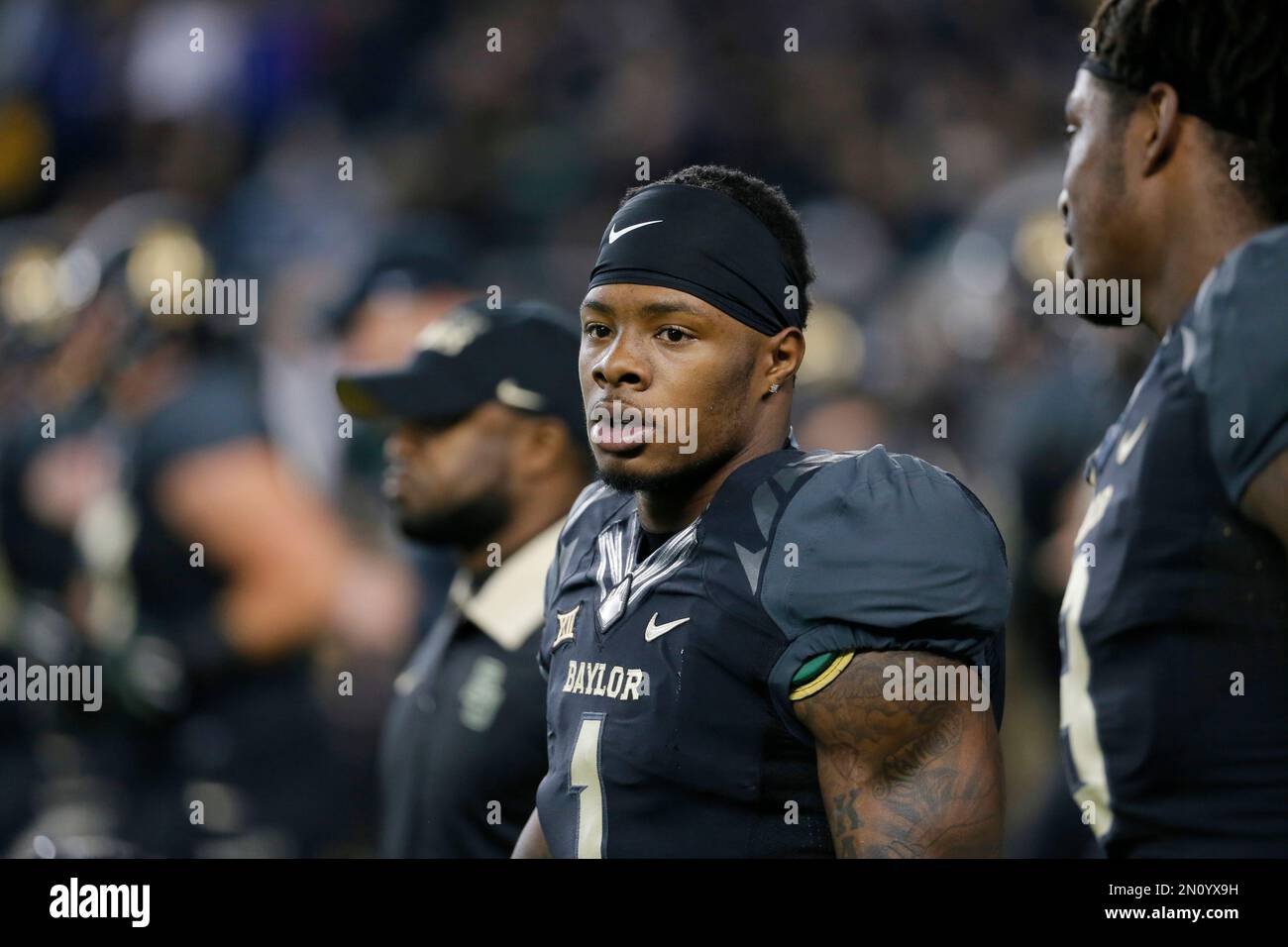 Baylor wide receiver Corey Coleman talks with a teammate during warms ...