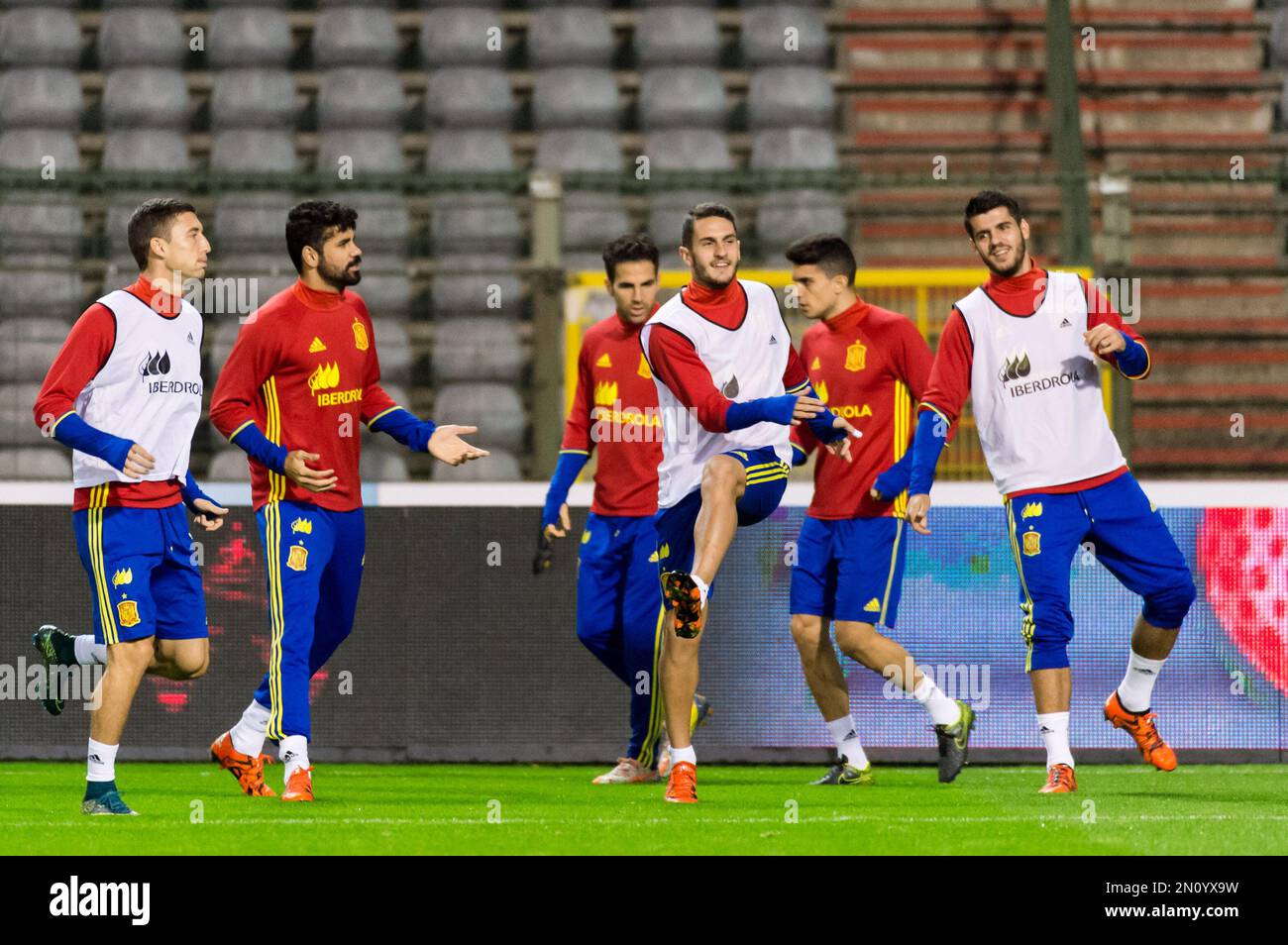 Spain's national soccer team players warm up during a training session ...