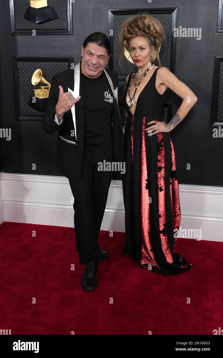 Robert Trujillo, left, and Chloe Trujillo arrive at the 65th annual ...