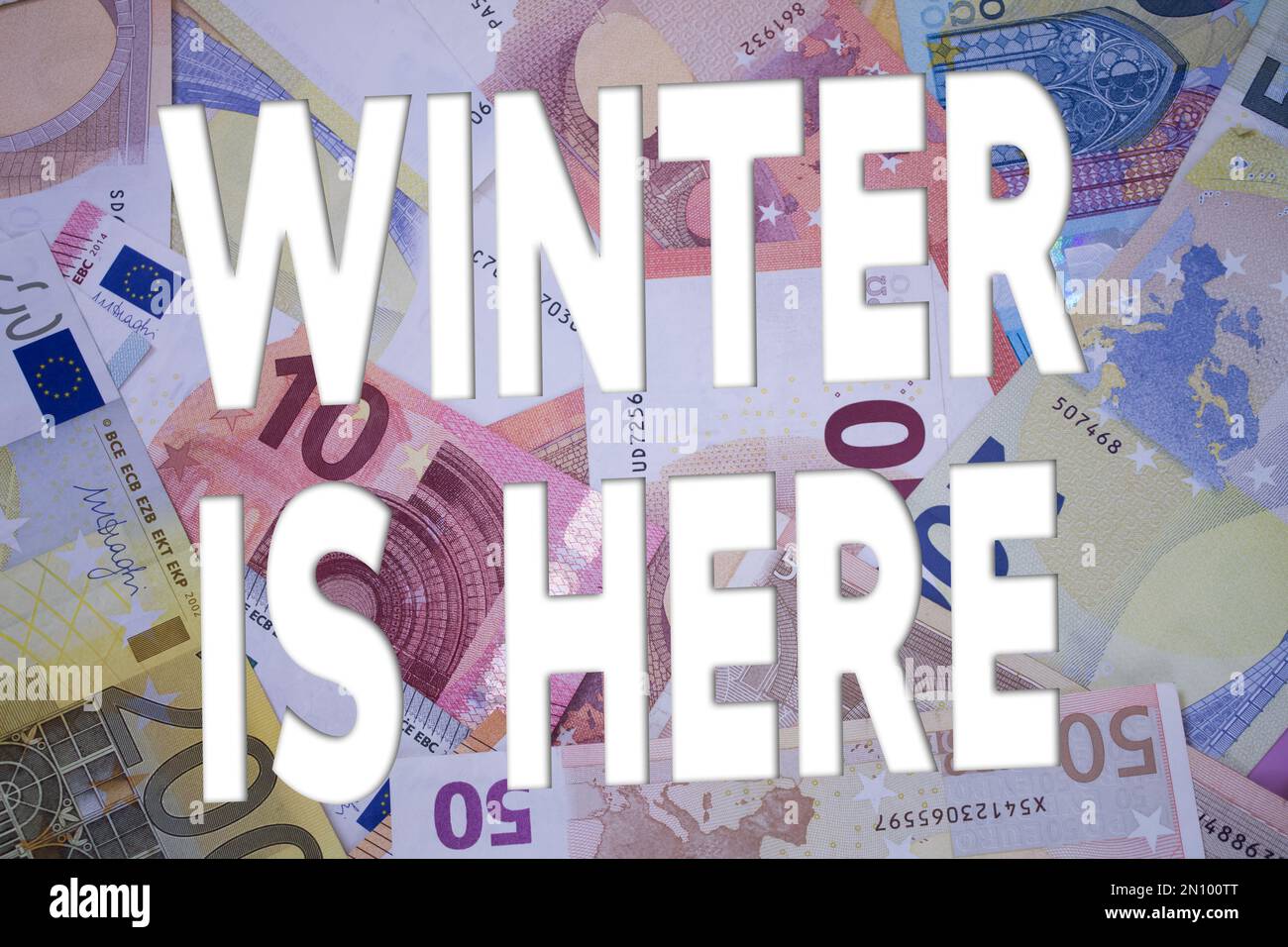 Winter is Here word with money. Paper currency background with ...