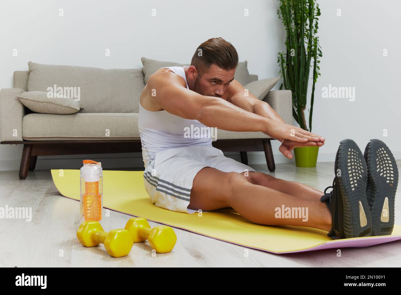 Man sport does muscle and body stretching, pumped up man fitness ...