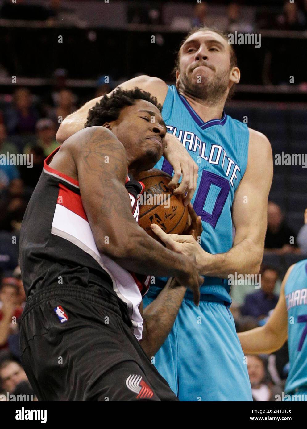 Charlotte Hornets' Spencer Hawes, right, and Portland Trail Blazers ...