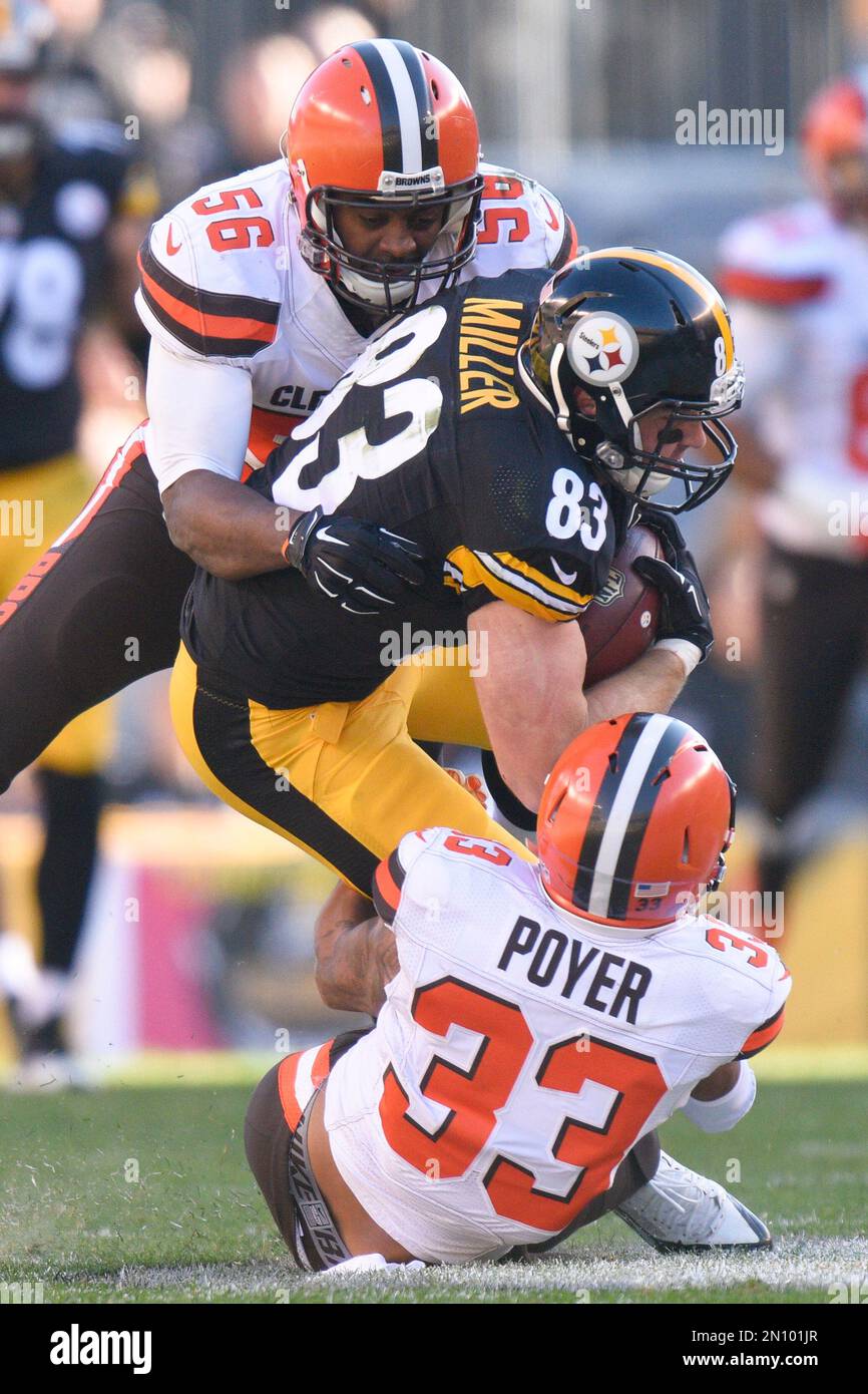 Pittsburgh Steelers tight end Heath Miller (83) is hit by Cleveland ...