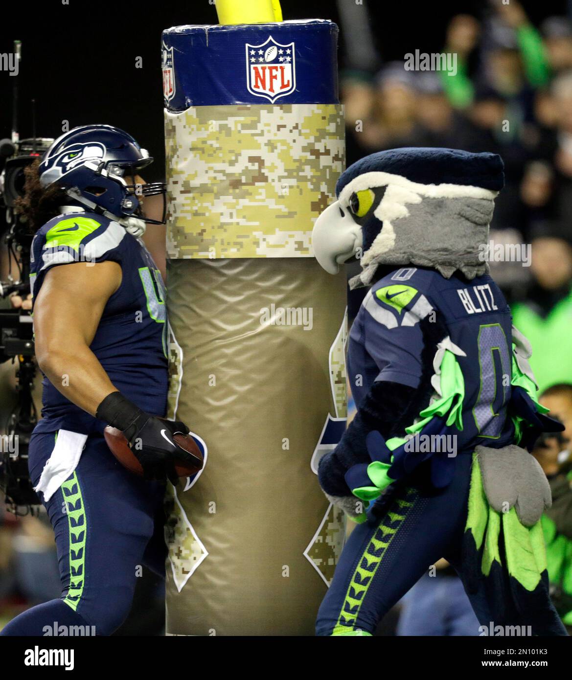 Seattle Seahawks fullback Will Tukuafu, left, celebrates with Blitz ...