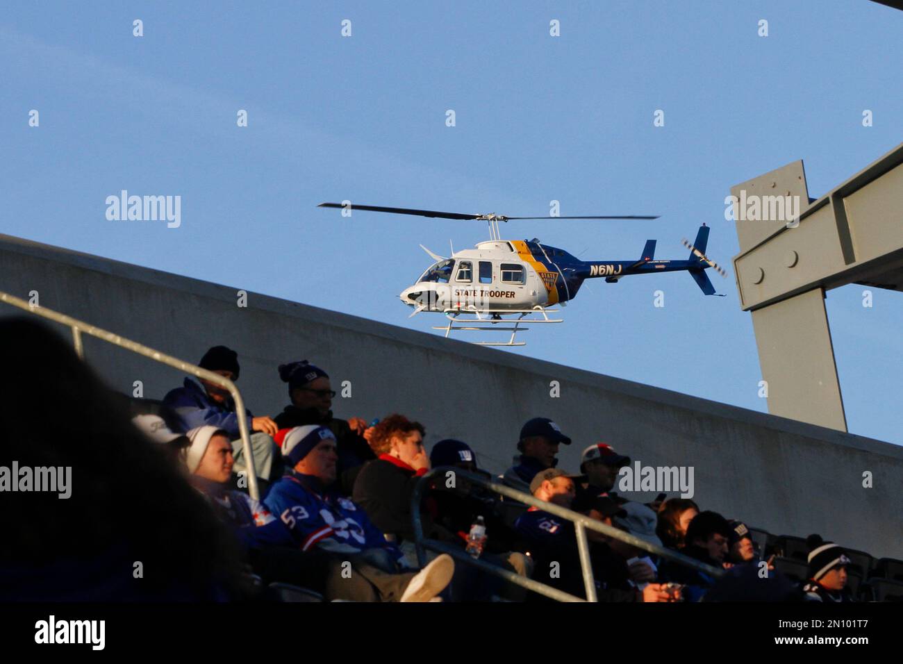 A New Jersey State Trooper helicopter patrols MetLife Stadium before an ...