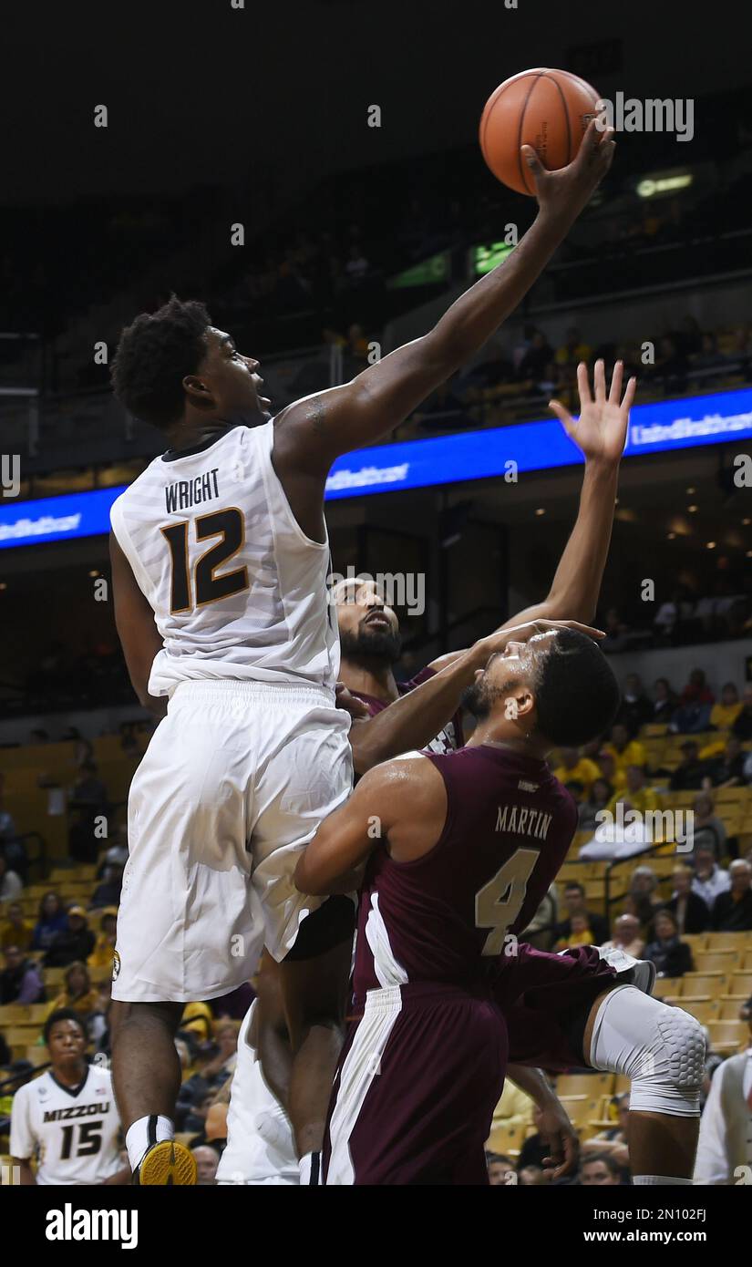 Missouri's Namon Wright, left, shoots over Maryland-Eastern Shore's ...