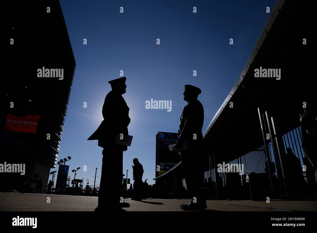 New Jersey State troopers stand near an entrance to MetLife Stadium ...