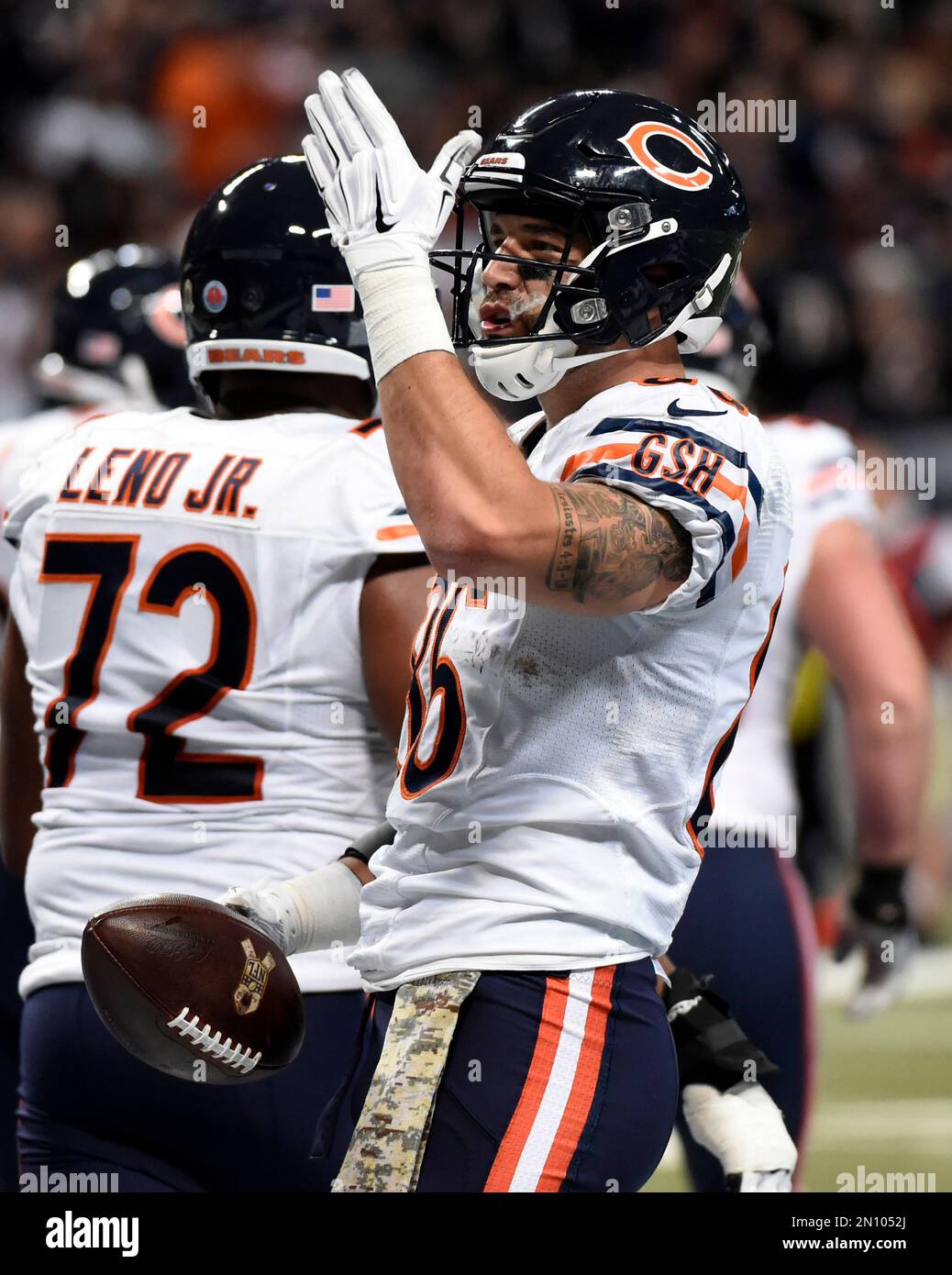 Chicago Bears tight end Zach Miller waves to the crowd after scoring a ...