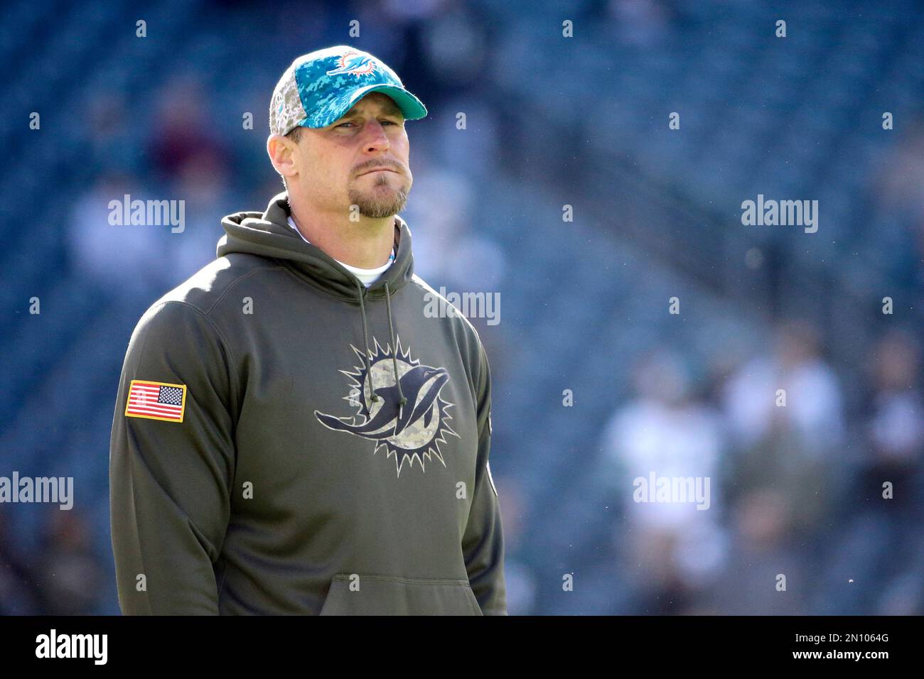 Miami Dolphins head coach Dan Campbell watches warm-ups before an NFL ...