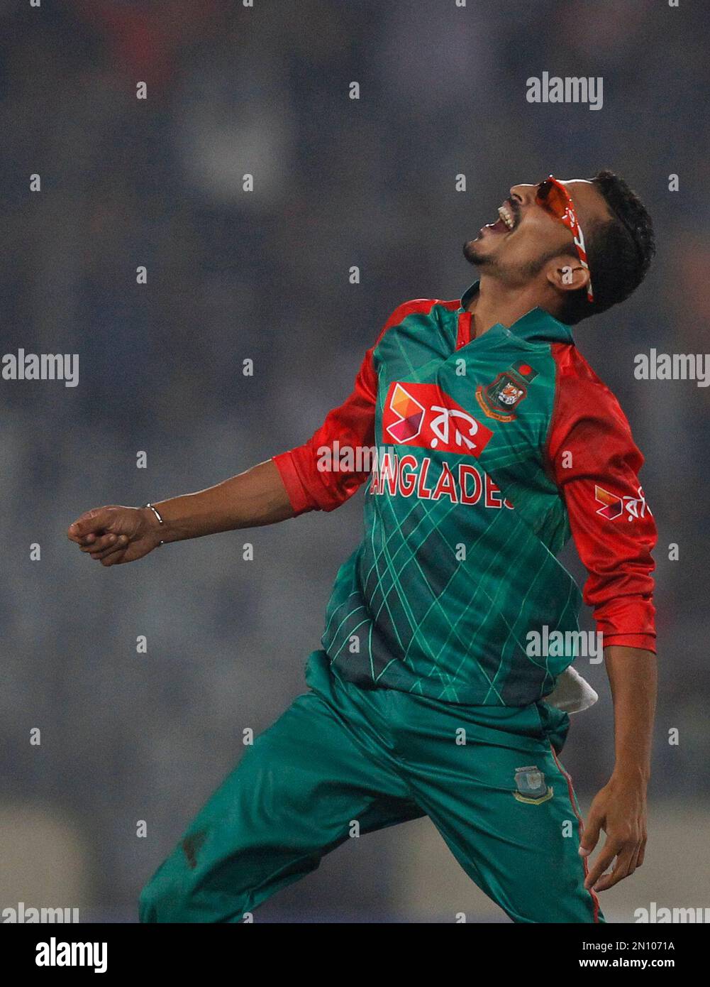 Bangladesh’s Nasir Hossain, celebrates after successfully breaking the ...