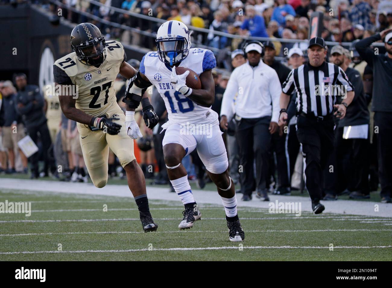 Kentucky running back Stanley Williams (18) is chased by Vanderbilt ...