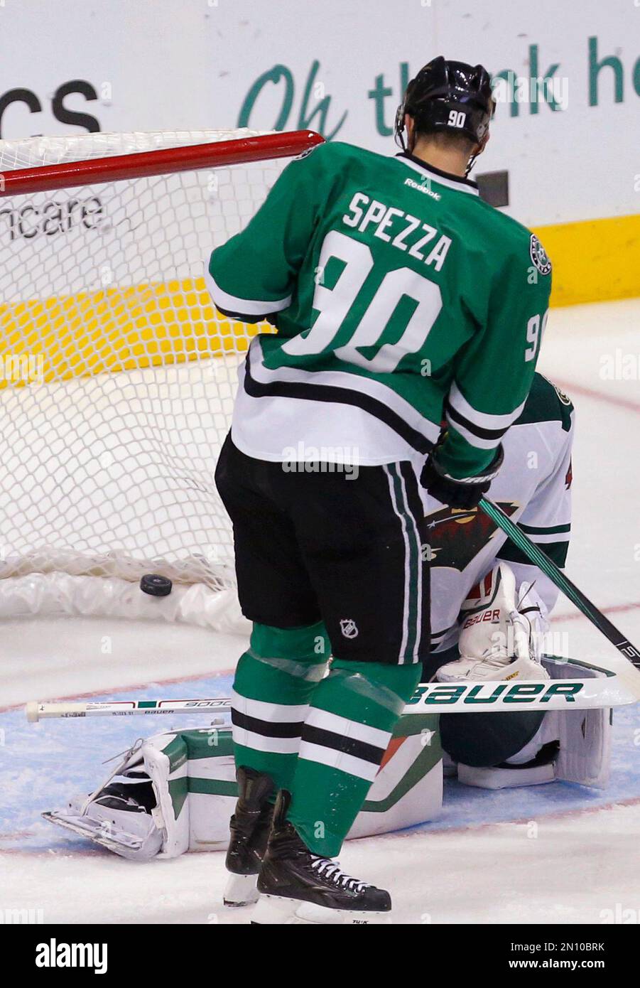 Dallas Stars forward Jason Spezza (90) tips a shot past Minnesota Wild ...