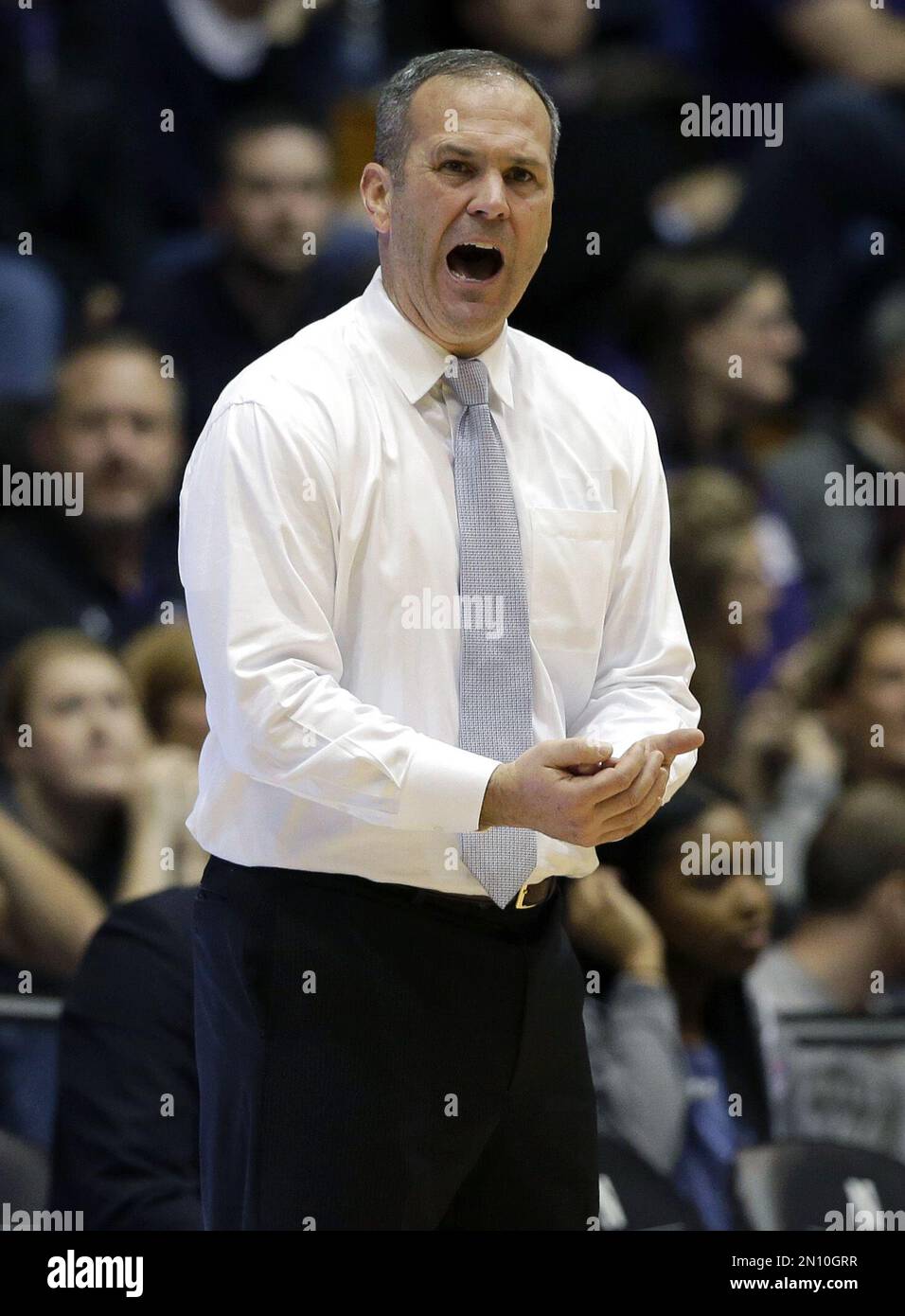 UMass-Lowell head coach Pat Duquette yells his team during the second ...