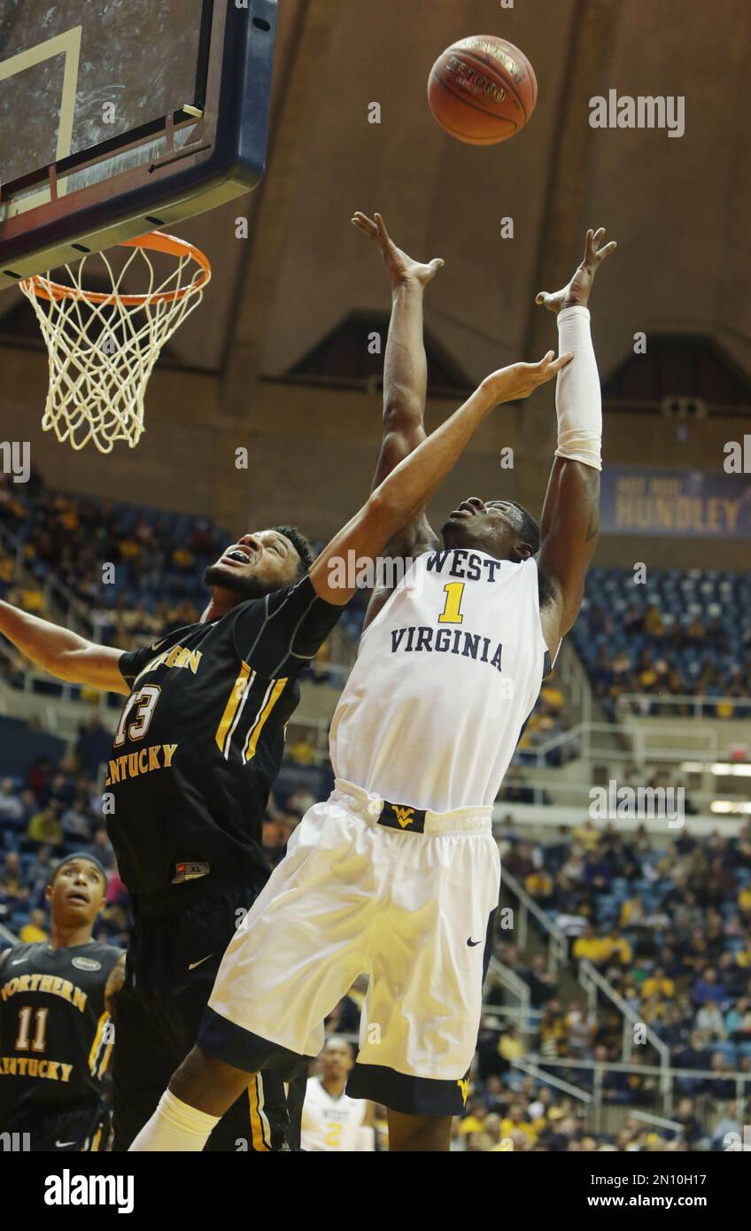 West Virginia forward Jonathan Holton (1) grabs a rebound from Northern ...