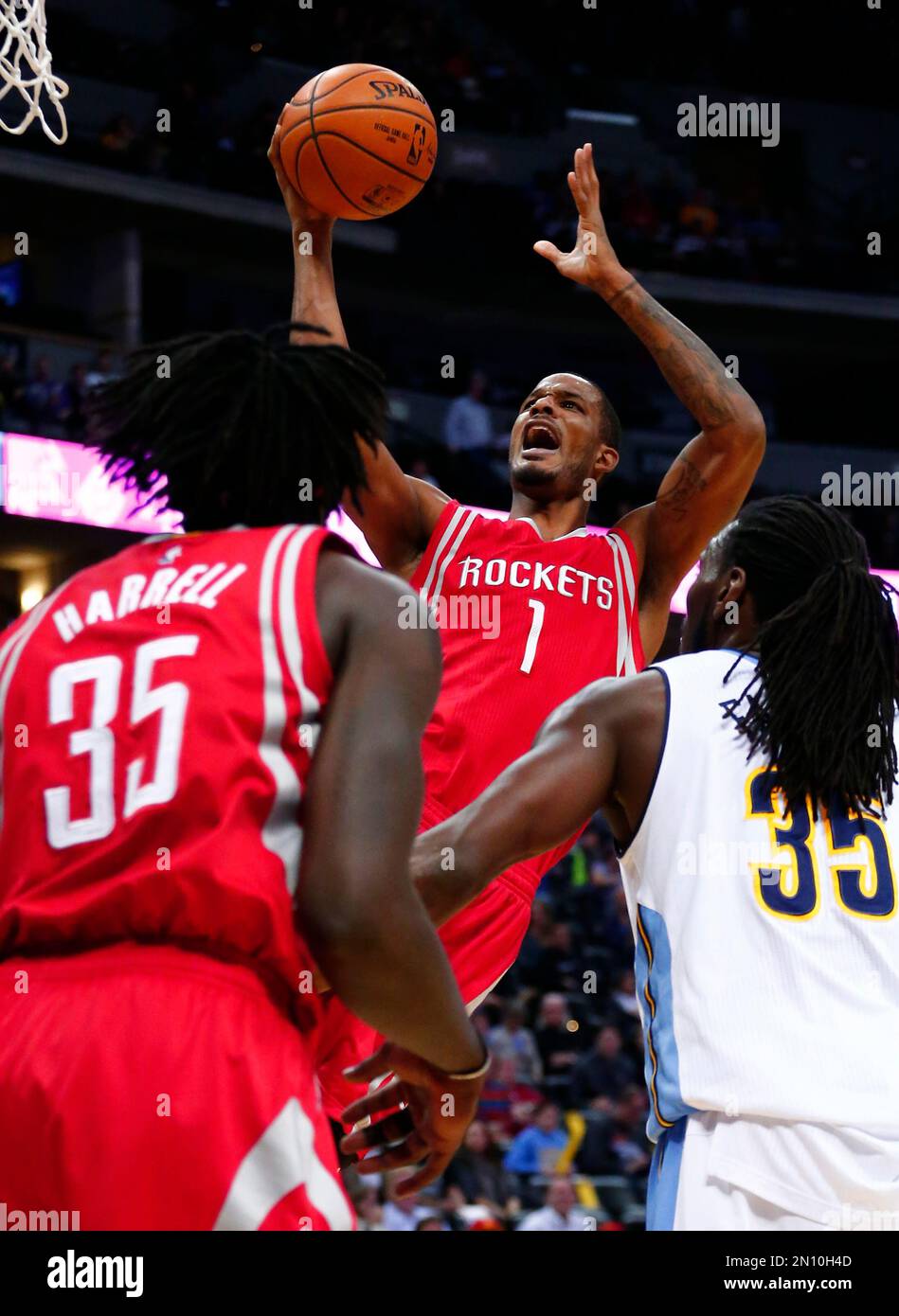 Houston Rockets forward Trevor Ariza goes up for a shot against the ...