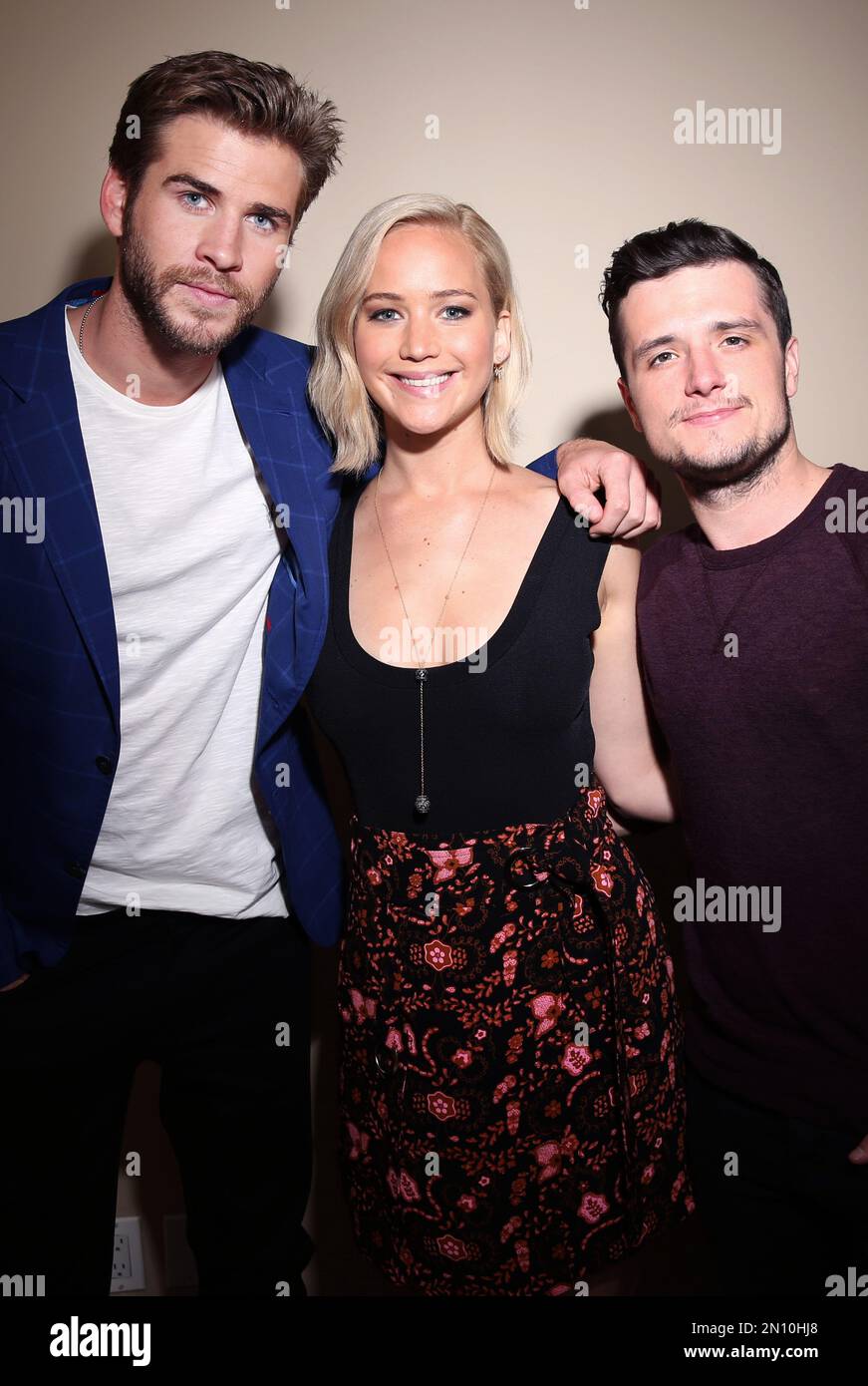 In this Saturday, Oct. 31, 2015 photo, actors Liam Hemsworth, from left ...