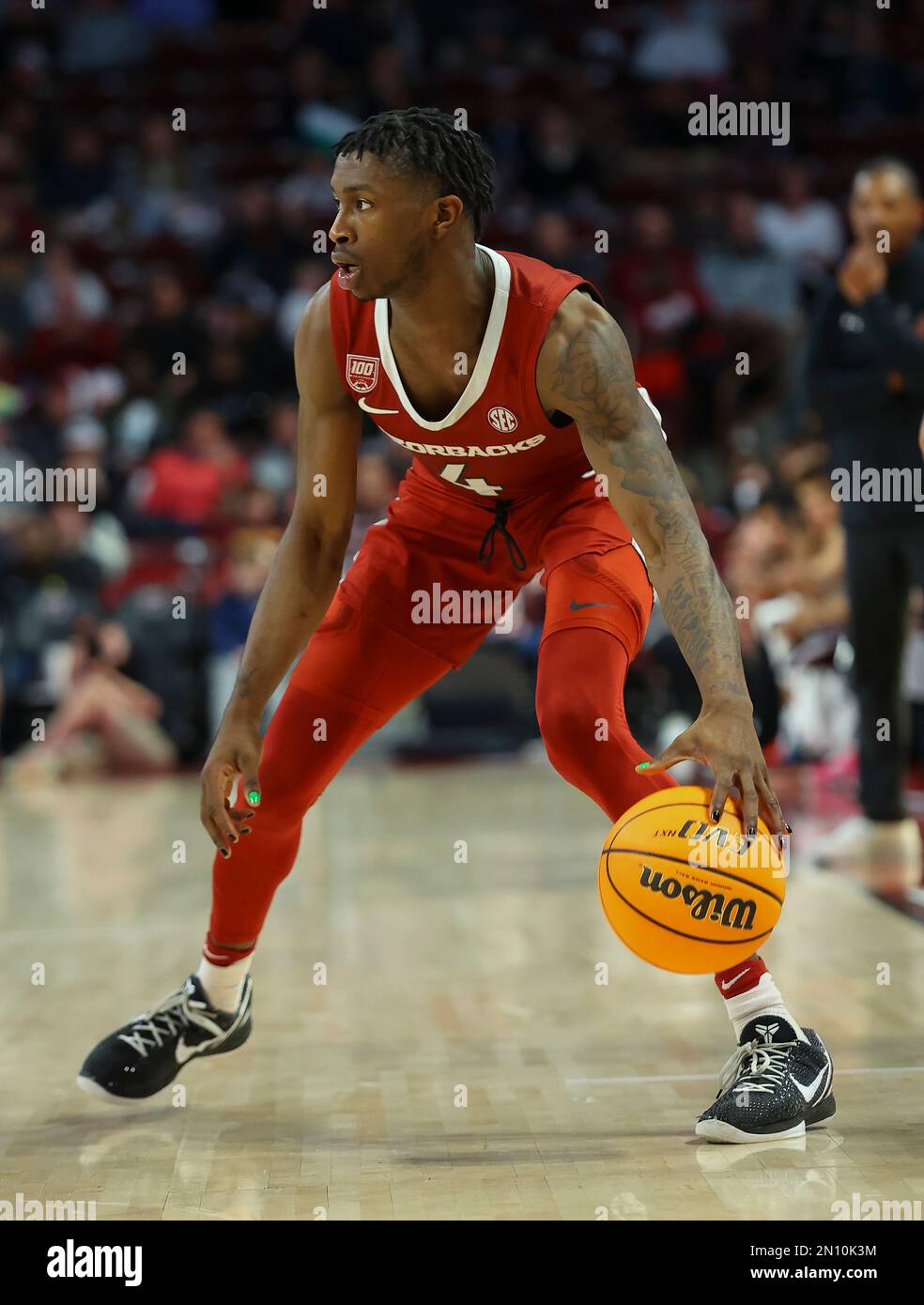 February 4, 2023: Arkansas junior Davonte Davis (4) dribbles ball. NCAA ...