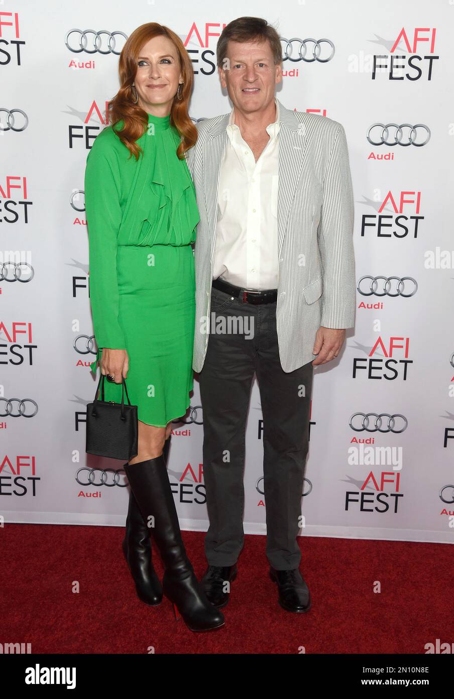 Tabitha Soren, left, and Michael Lewis arrive at the world premiere of ...