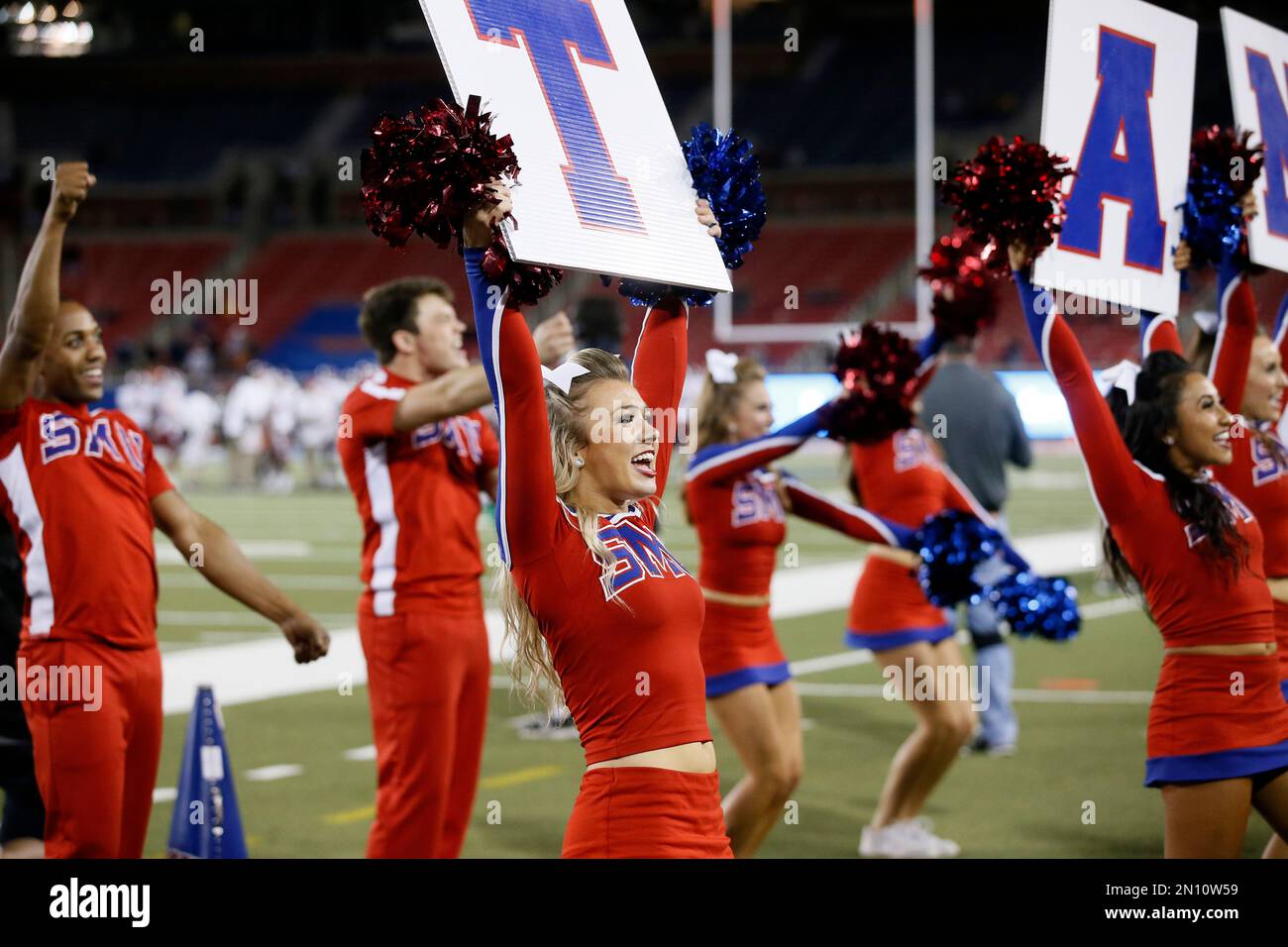 The SMU cheerleaders perform during an NCAA college football game ...
