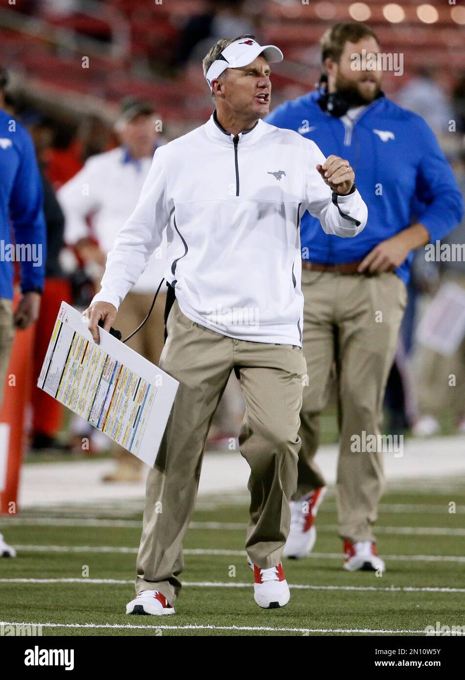 SMU head coach Chad Morris instructs his team during an NCAA college ...