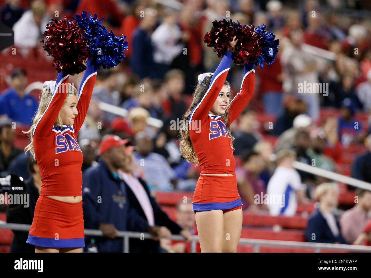 The SMU cheerleaders perform during an NCAA college football game ...