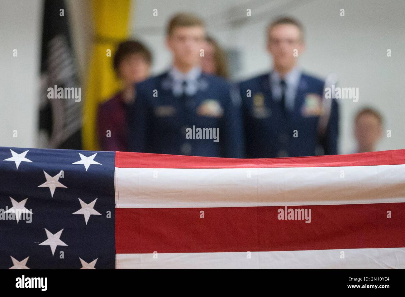 An American flag is folded as members of Lebanon High School's Air ...