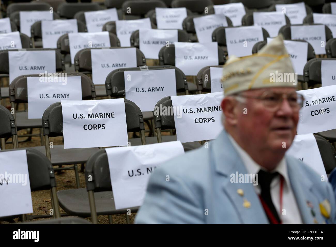 Reserved seats are marked with different branches of the military ...