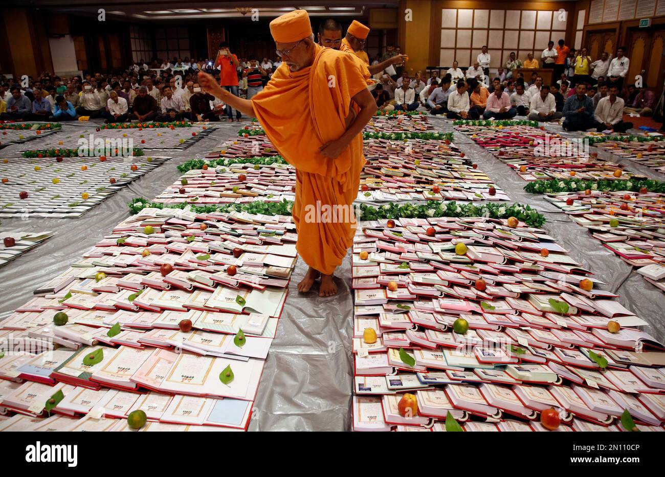 Hindu priests perform rituals on accounting books during Diwali in ...