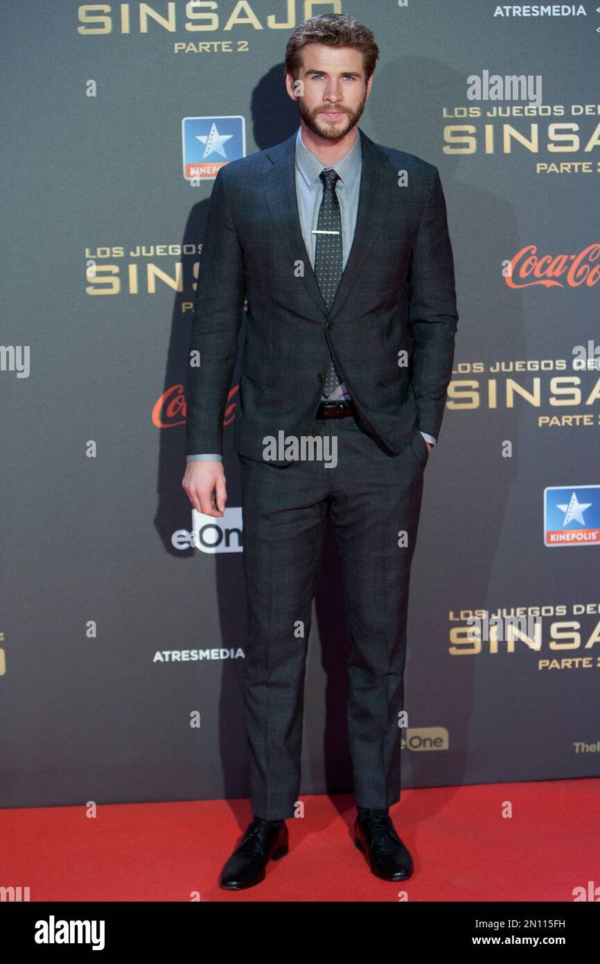 Australian actor Liam Hemsworth poses for photographers during the ...